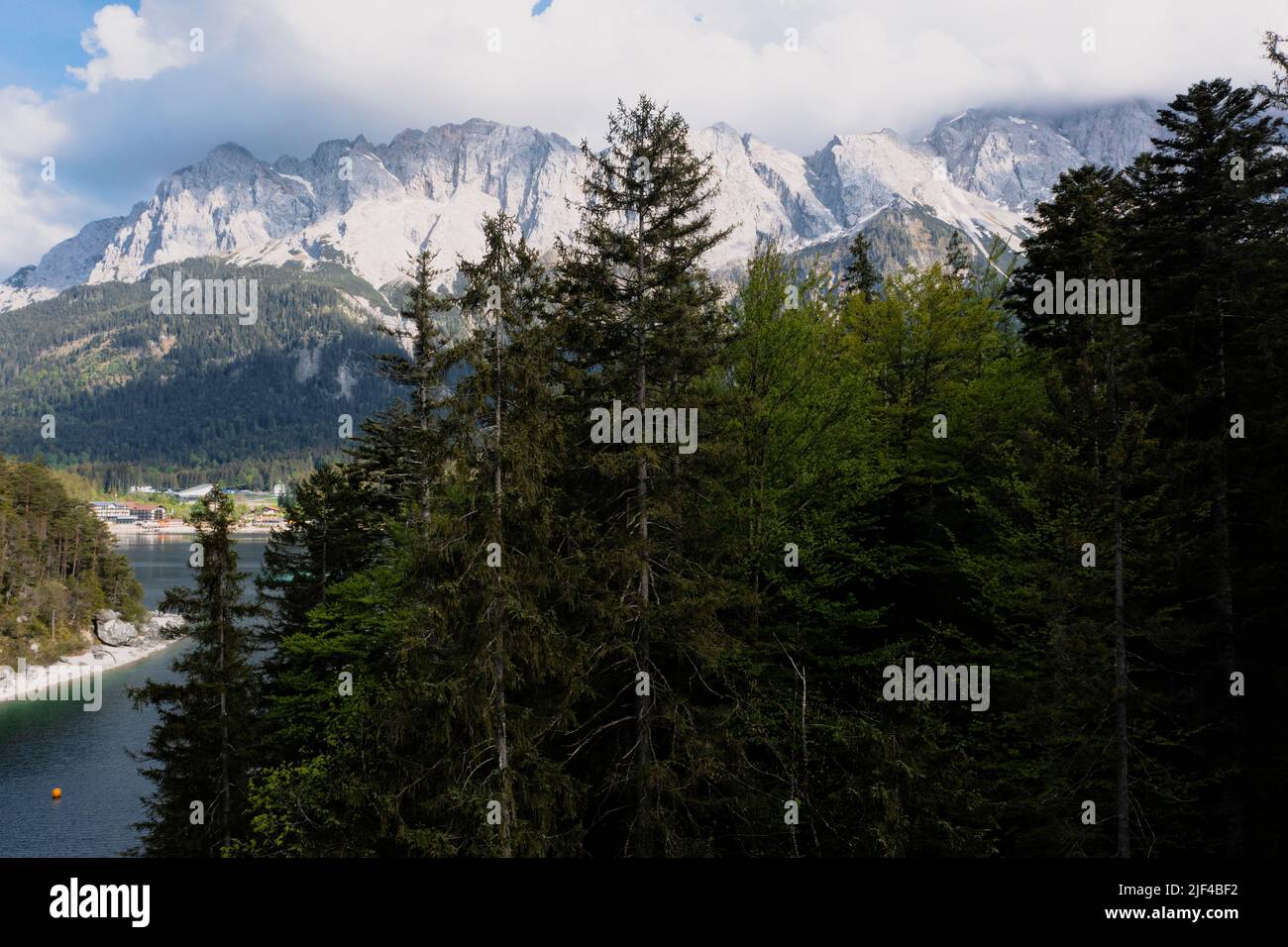 Aerial landscape of Eibsee Lake with turquoise water in front of ...
