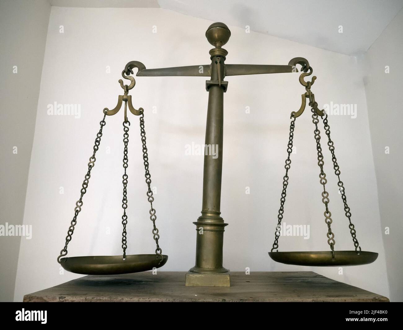 old bronze justice balance isolated on white Stock Photo - Alamy