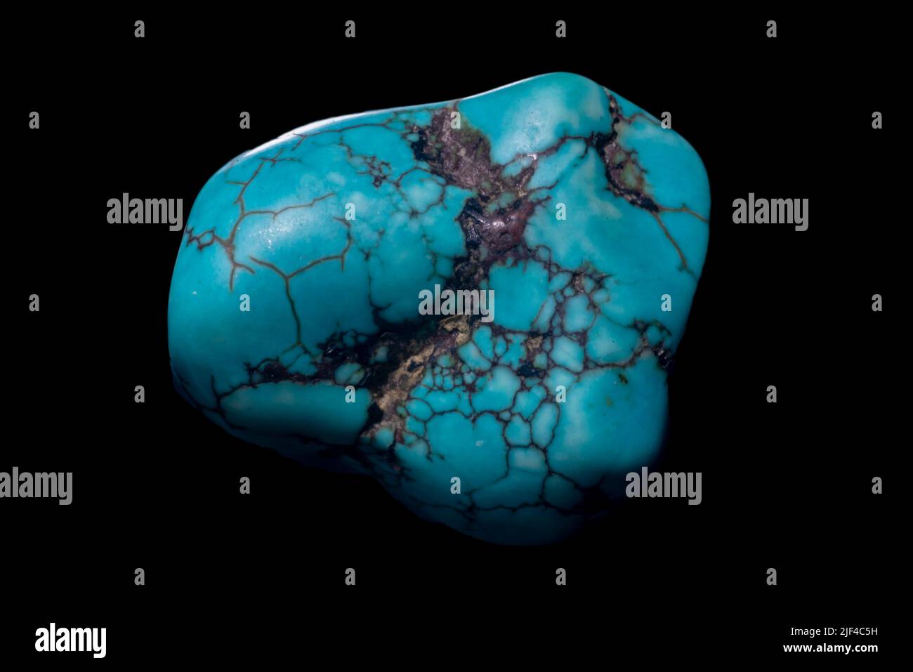 Raw turquoise gemstone rock isolated on a black background Stock Photo ...