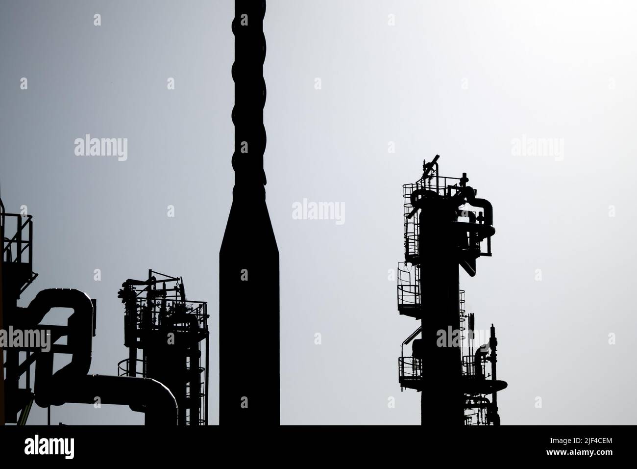 oil refinery silhouette isolated on white background Stock Photo - Alamy