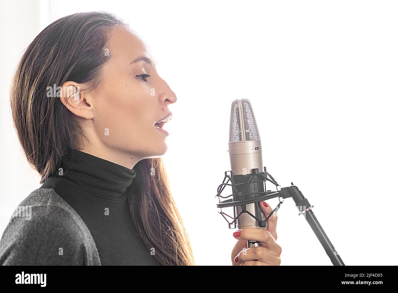 Young asian person pop singer mic hi-res stock photography and images ...