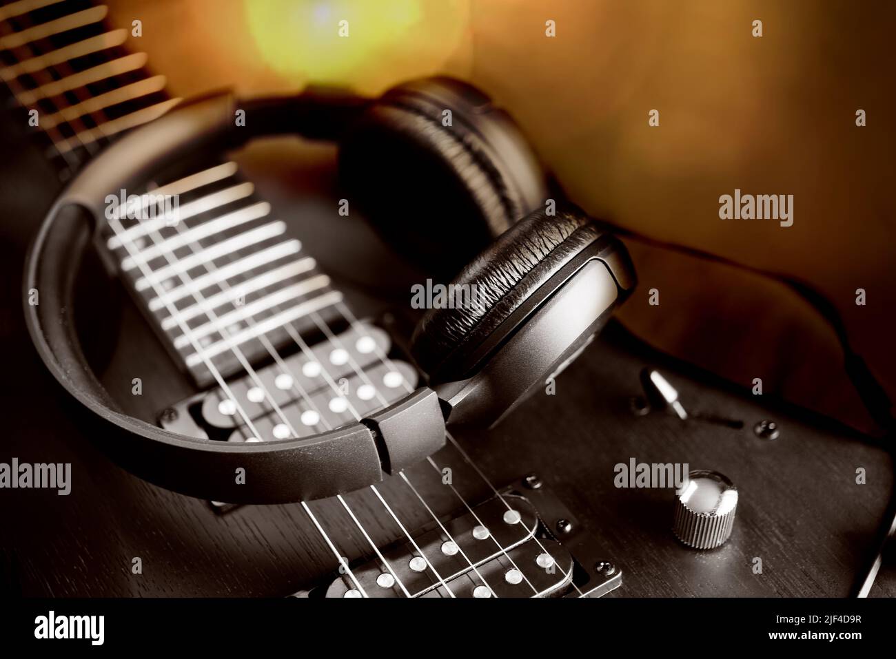 Musical instrument - electric guitar and headphones. Sound banner ...