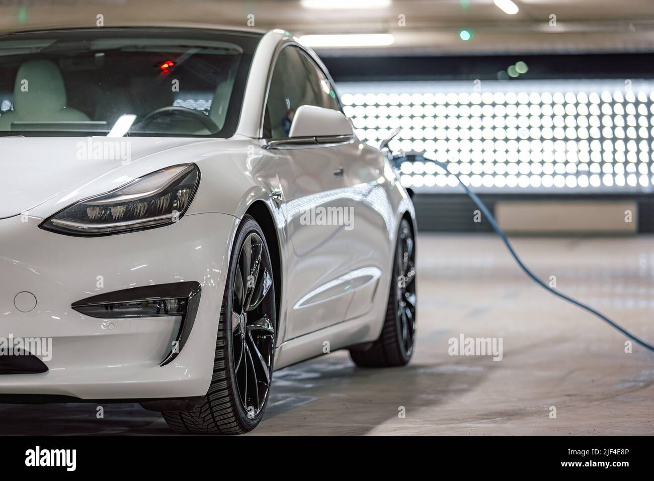 Electric car parking garage hi-res stock photography and images - Alamy