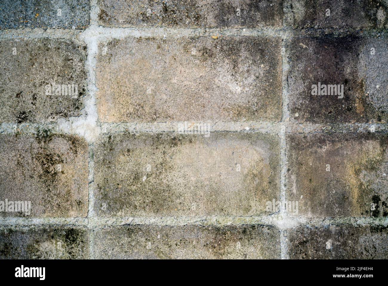 Old gray brick wall background and texture Stock Photo - Alamy