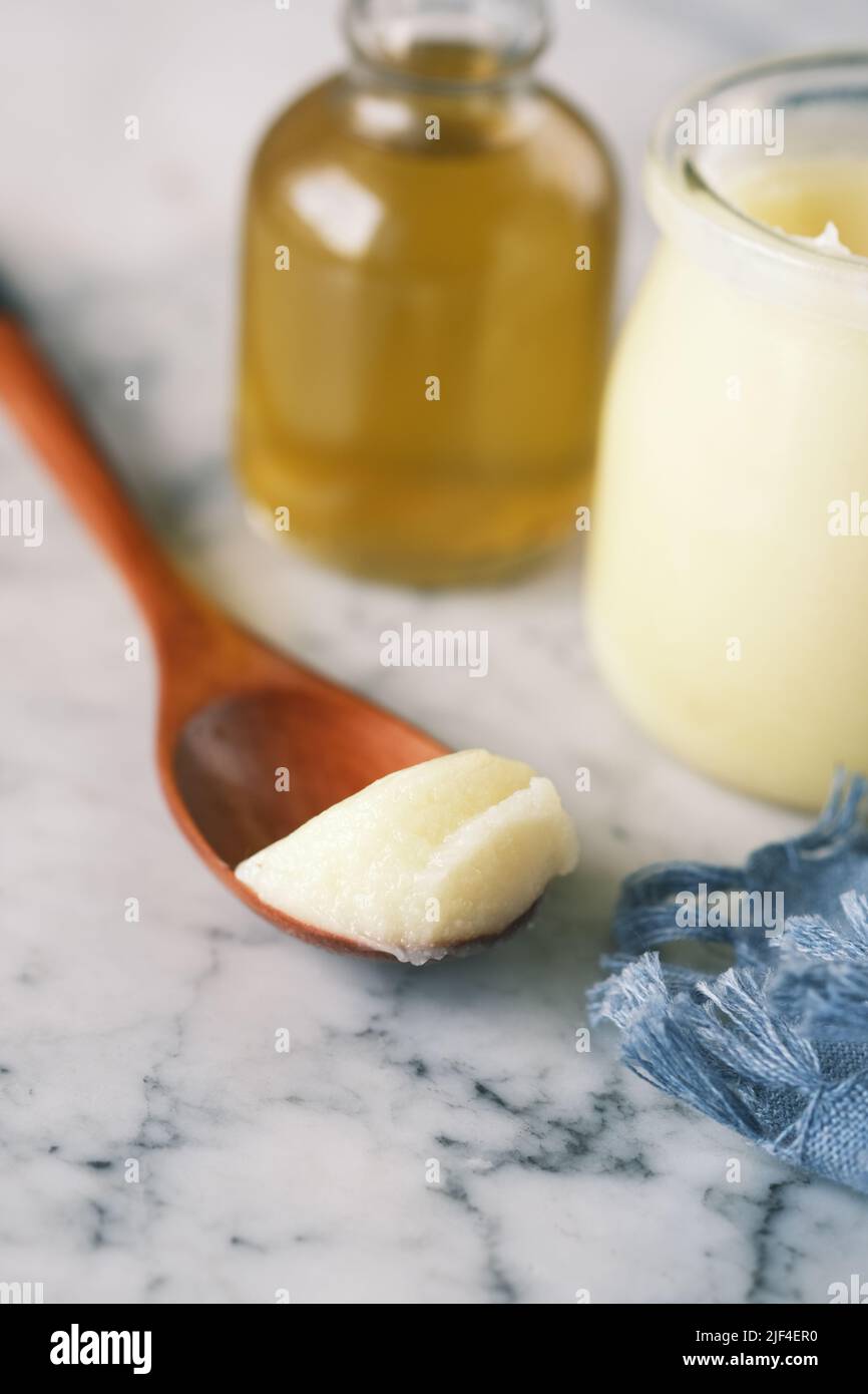 homemade ghee in container on a table Stock Photo - Alamy