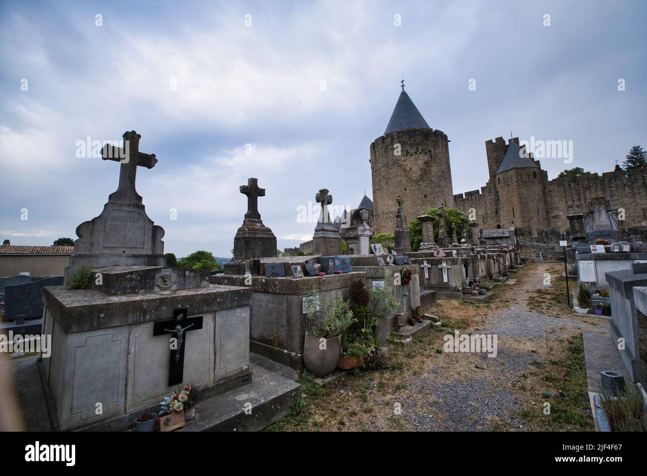 View of the tombstones at the cemetery de la Conte with on background ...