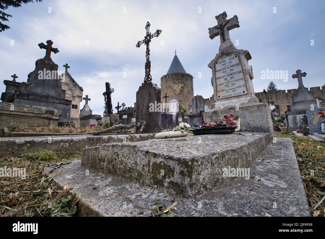 View of the tombstones at the cemetery de la Conte with on background ...