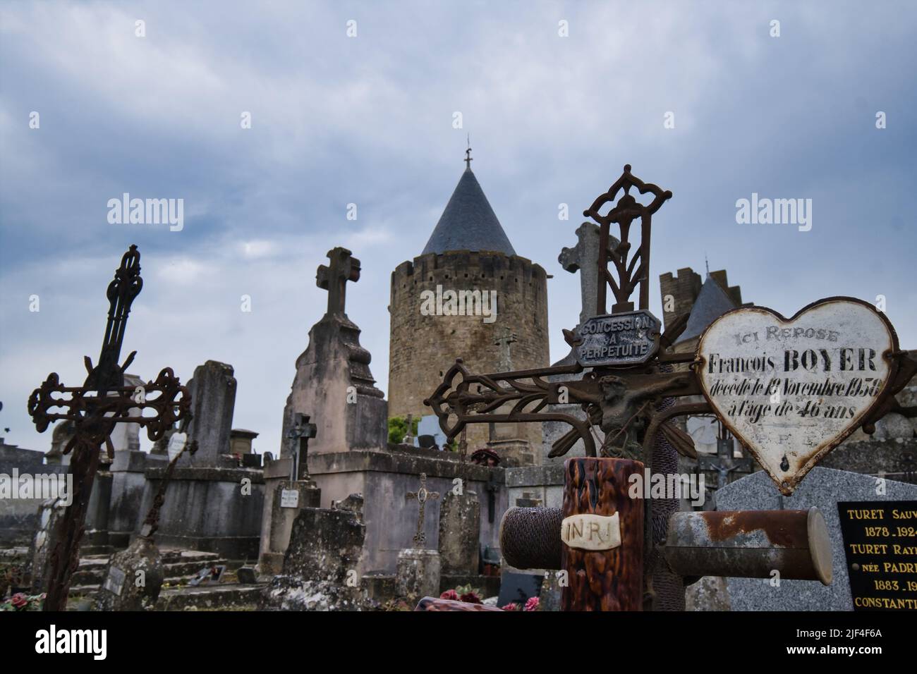 View of the tombstones at the cemetery de la Conte with on background ...