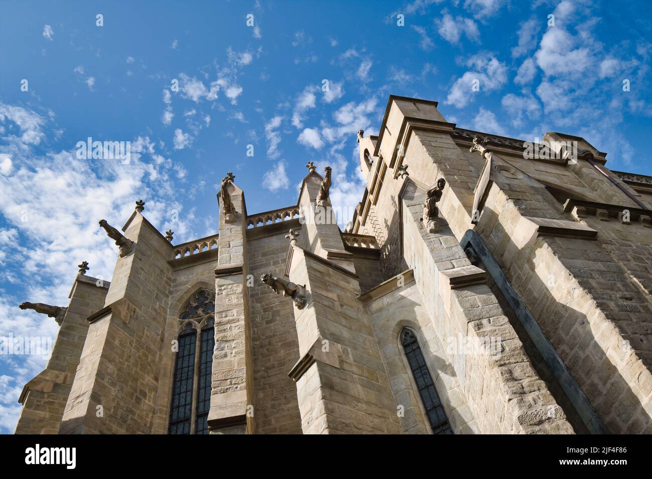 Low angle view of the exterior of the apse of the Saint-Michel ...