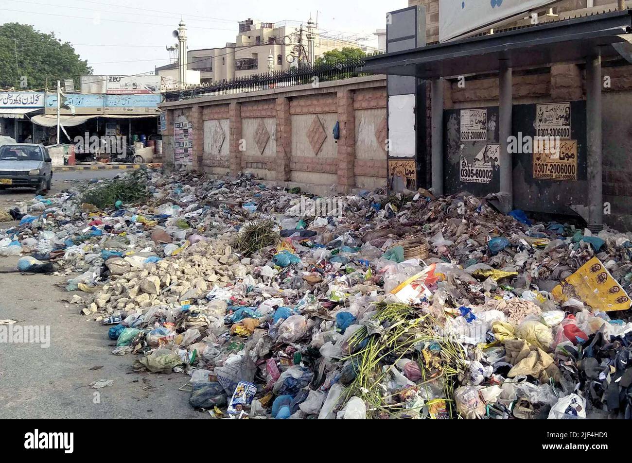 Hyderabad, Pakistan, June 29, 2022. Huge heap of garbage creating ...