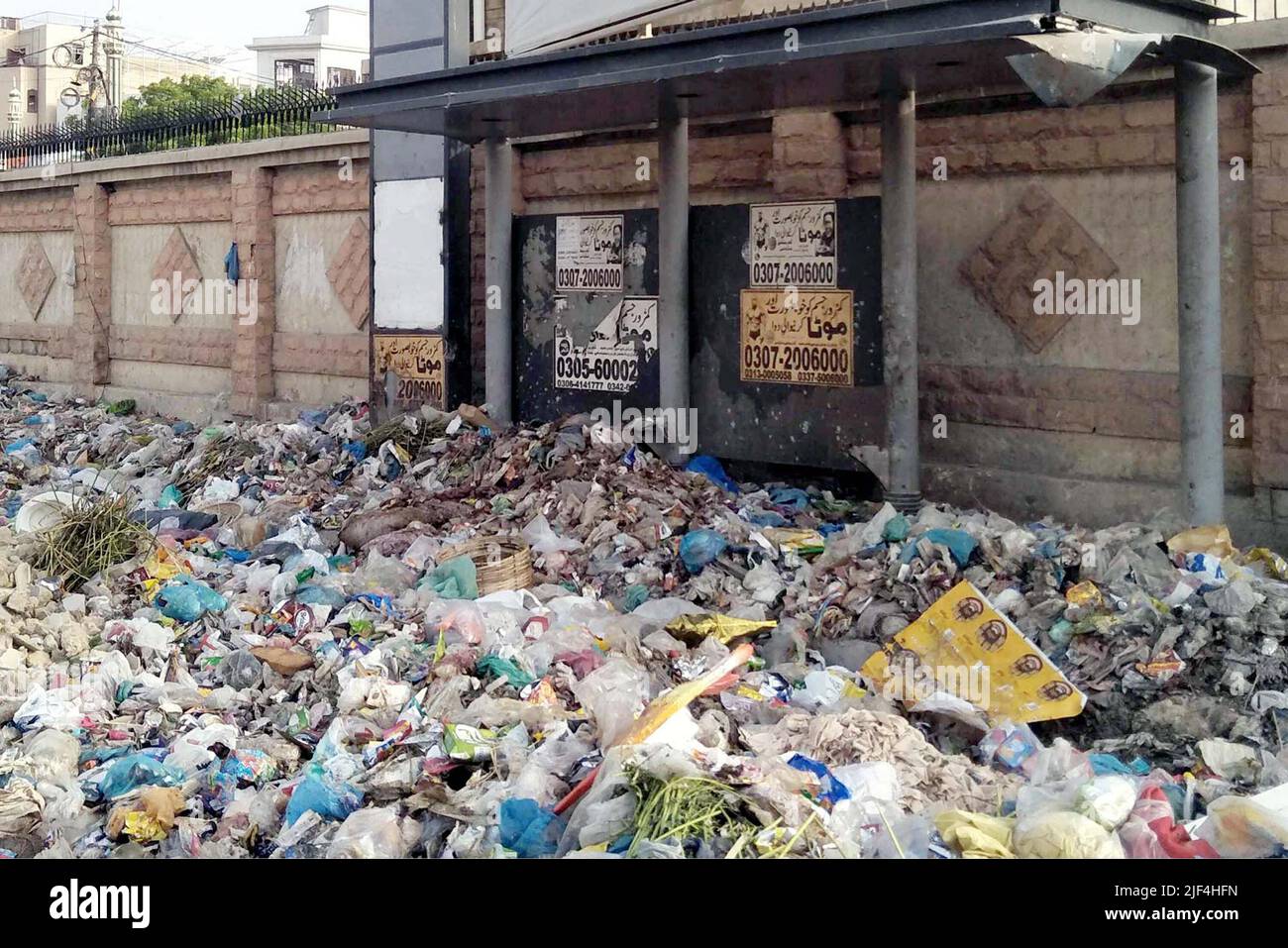 Hyderabad, Pakistan, June 29, 2022. Huge heap of garbage creating ...