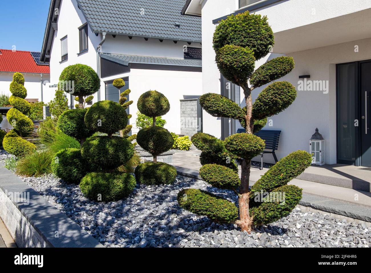 Modern and well-kept front garden with exceptionally beautiful planting ...