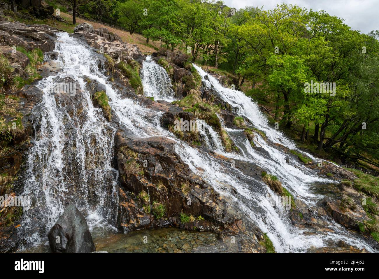 Waterfalls beside the Watkin Path in Cwm Llan, Snowdonia national park ...