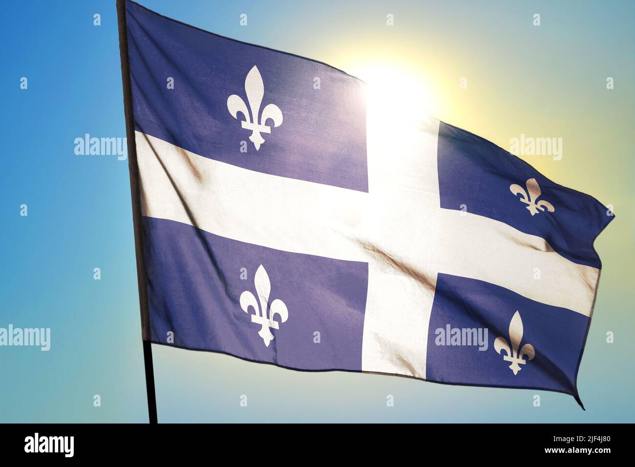 Quebec province of Canada flag waving on the wind Stock Photo - Alamy