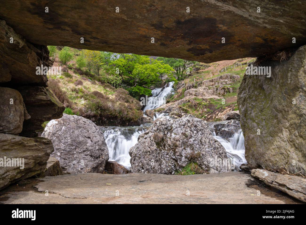 View through the stone bridge beside the Watkin path of the Waterfalls ...