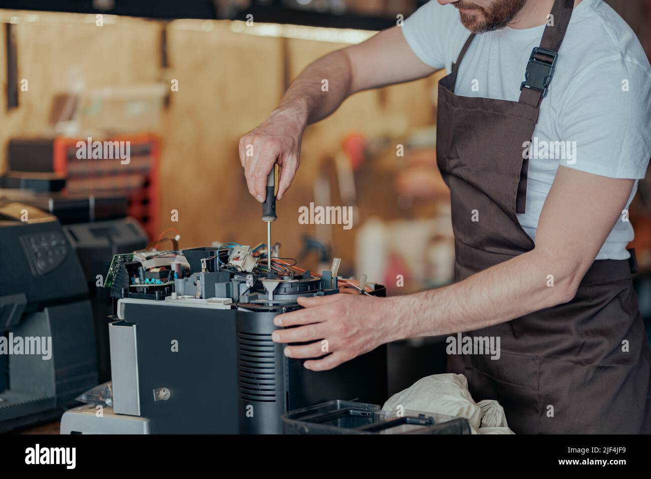 Technician fixing a coffee machine hi-res stock photography and images ...