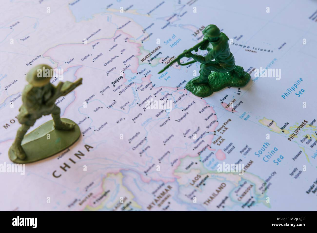 China and Taiwan conflict or war concept photo with figure soldiers on ...