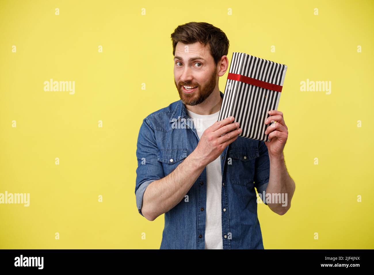 Happy man looking great gift hi-res stock photography and images - Alamy