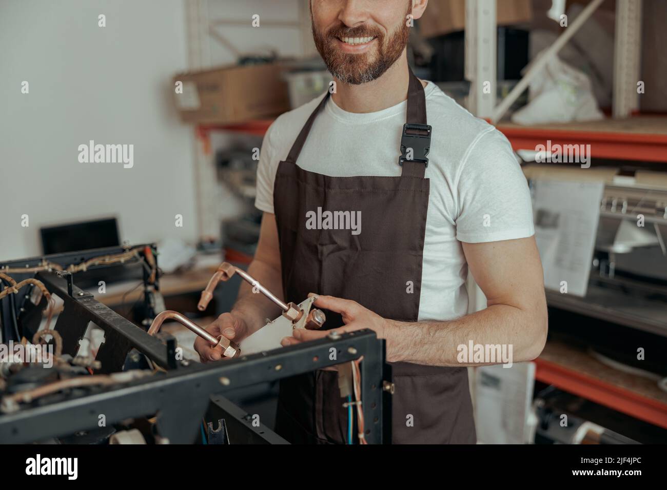 Technician fixing a coffee machine hi-res stock photography and images ...
