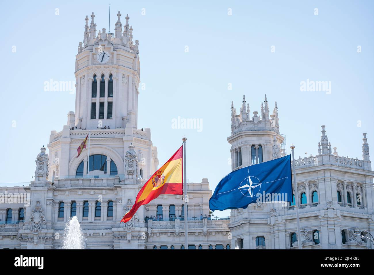 Cibeles fountain is pictured with flags of NATO and Spain during the ...