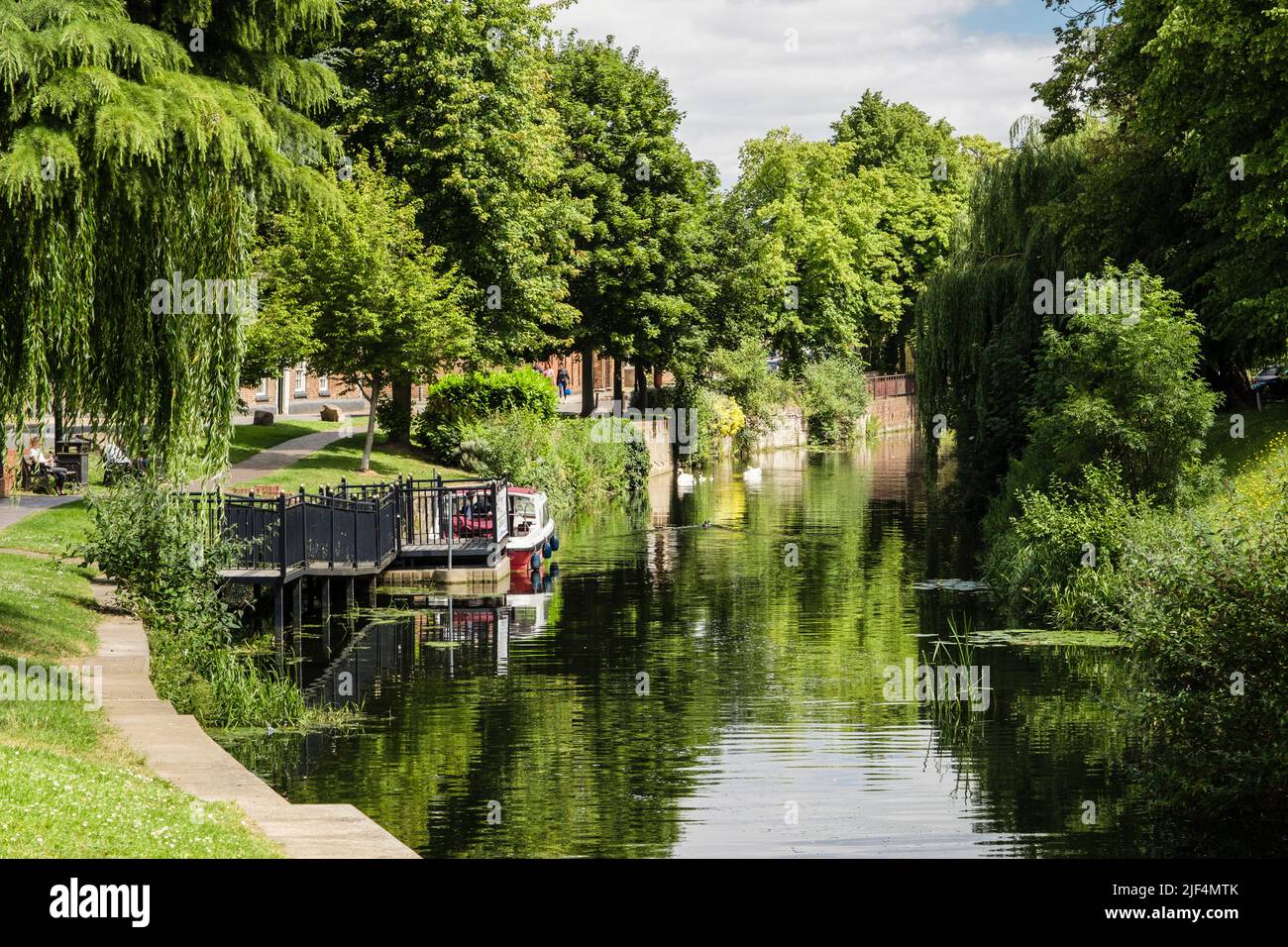 View along the tree lined River Welland in summer to water taxi landing ...