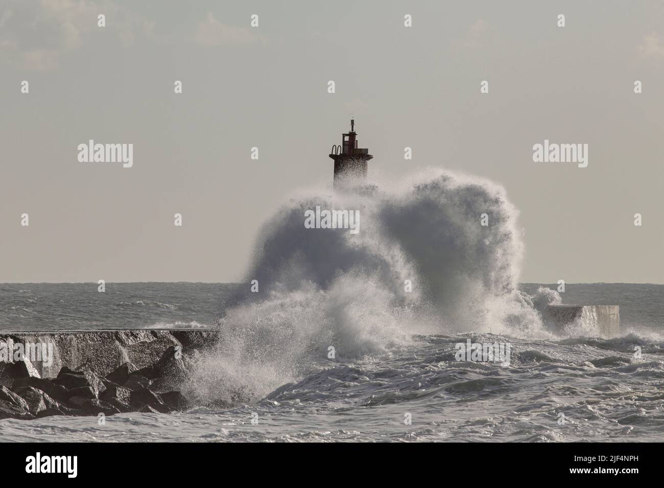 Ave river mouth storm, north of Portugal, seeing big wave splash over ...