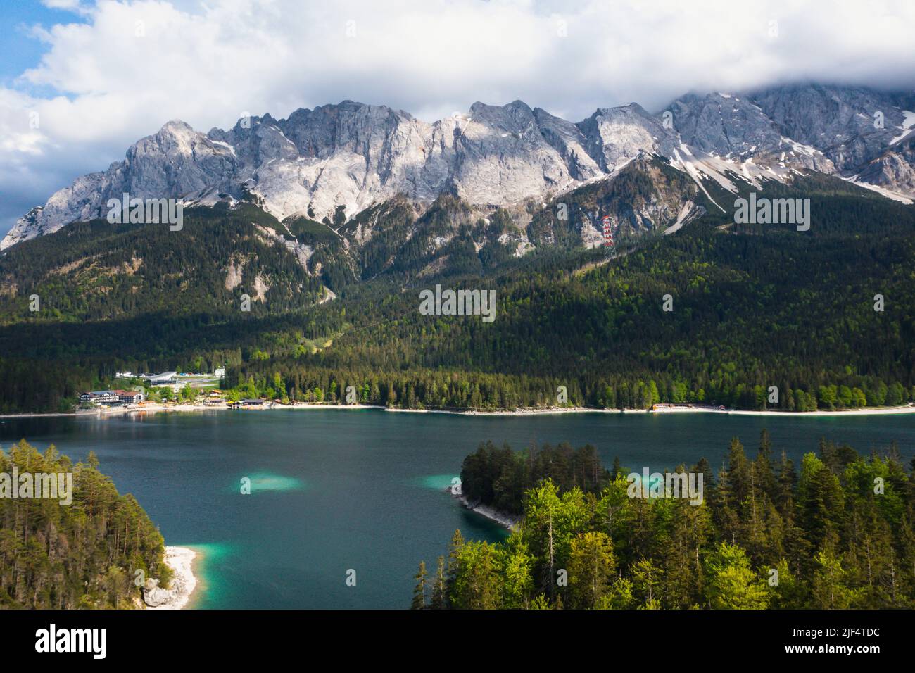 Aerial landscape of Eibsee Lake with turquoise water in front of ...