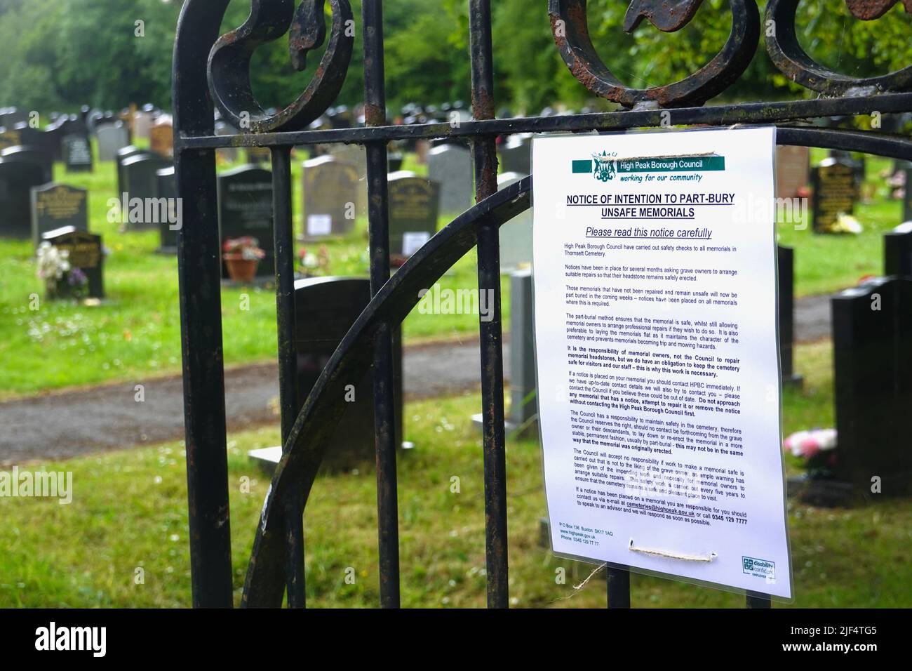 A notice at Thornsett Cemetery, New Mills, Derbyshire that unsafe ...