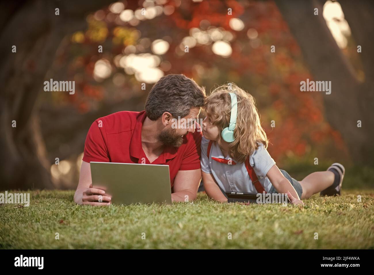 happy family blogging. childhood and parenthood. happy boy listen music ...