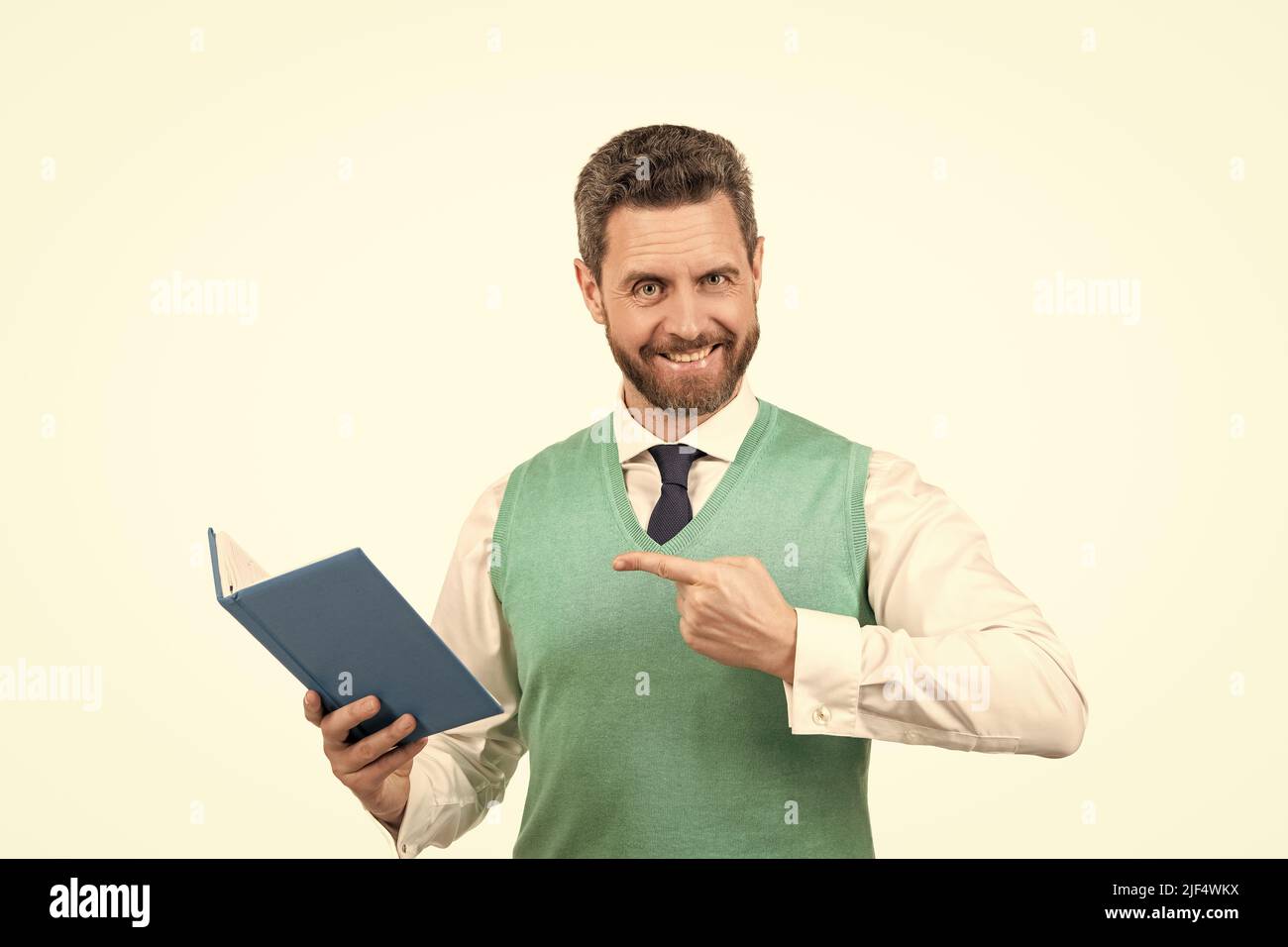 happy businessman pointing finger on book isolated on white background ...