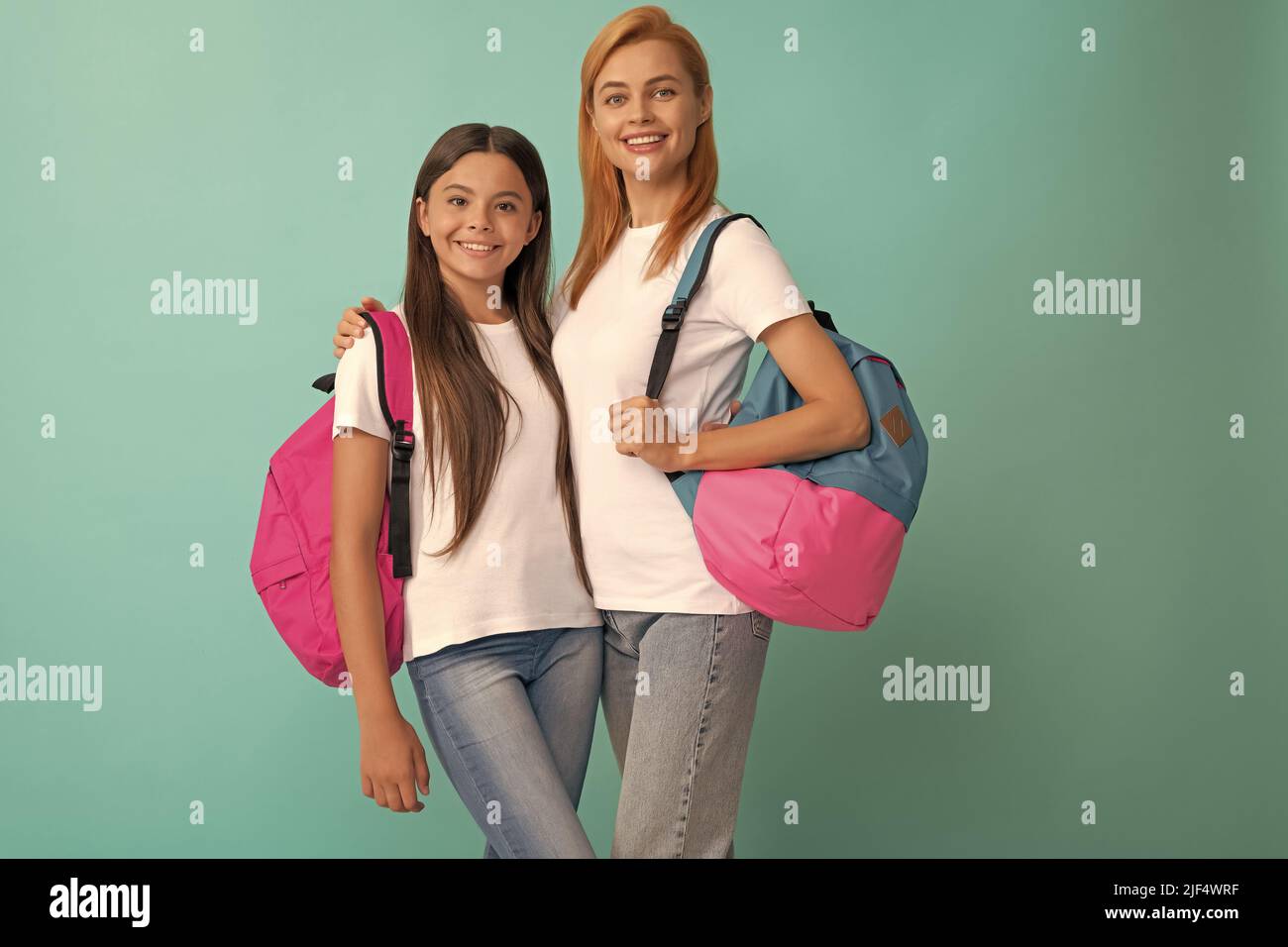 family help. mother and daughter carry backpack. friendship. back to ...