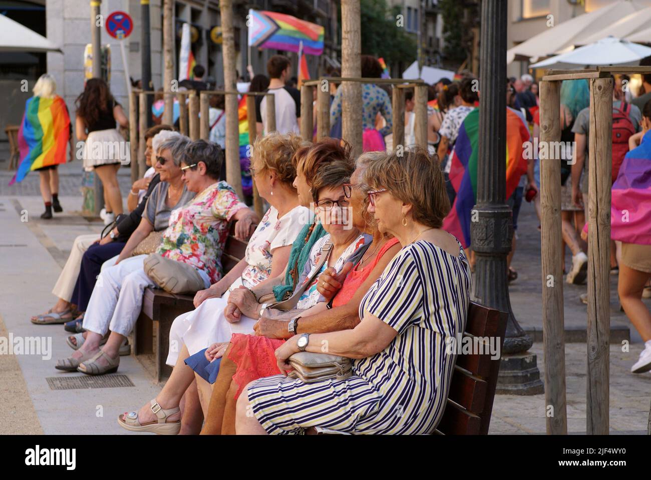 older ladies sitting watching the gay pride demonstration Stock Photo ...