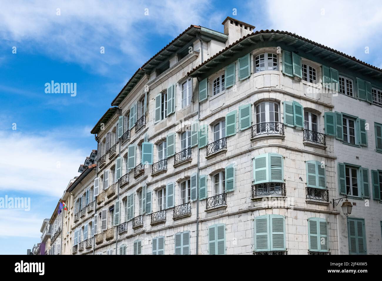 Bayonne in the pays Basque, typical facades with colorful shutters in ...