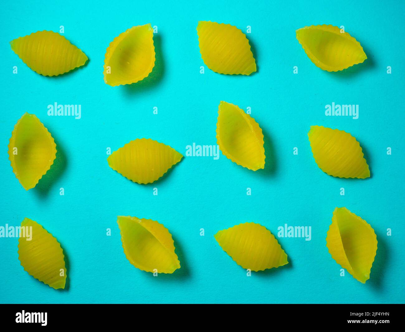 Shell-shaped pasta on the table. Background. Italian food. Cuisine of ...