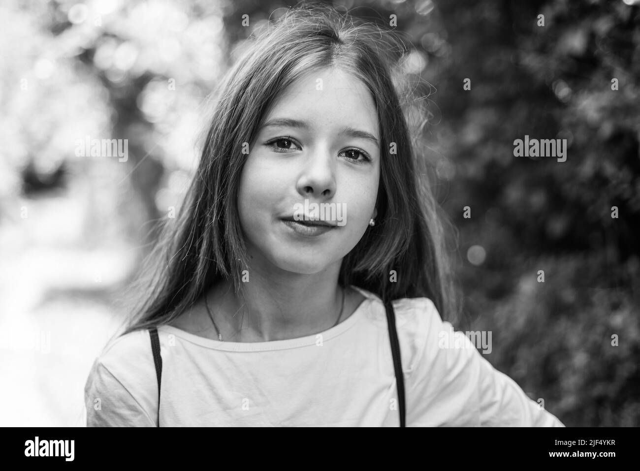 beautiful teen girl walking outdoor in summer or spring, childhood ...