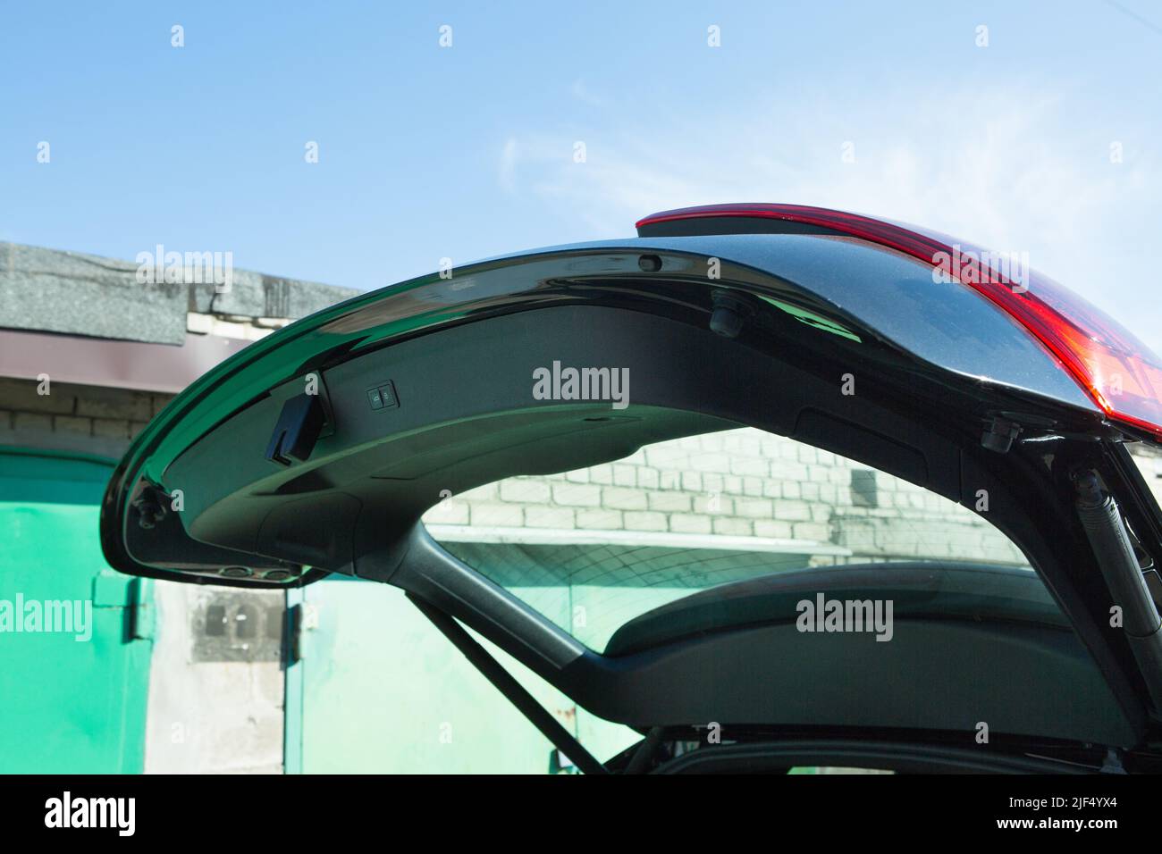 AUDI Q3 in black. Subcompact luxury crossover Audi Q3. View of the open ...