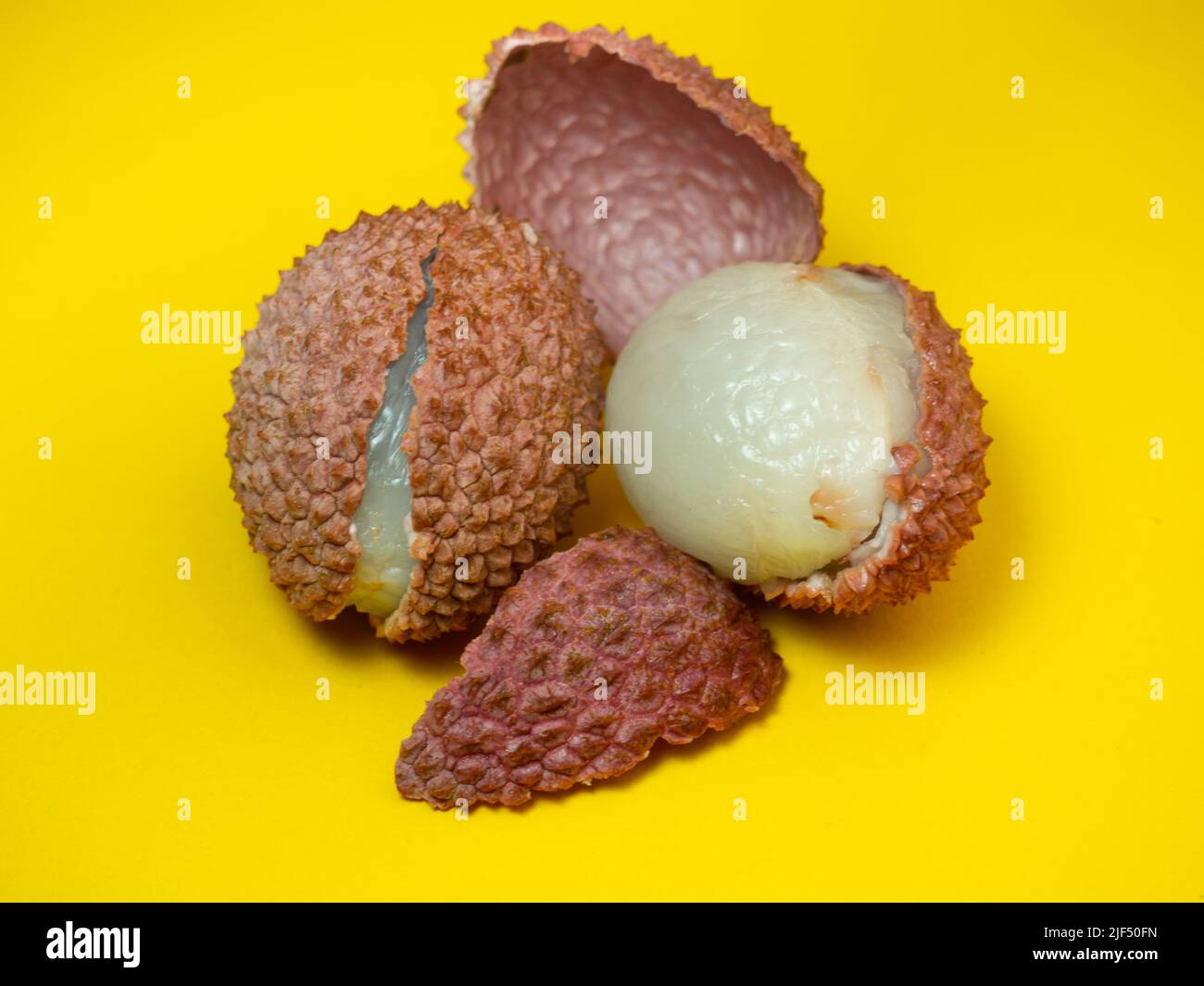 Sliced lychee. Chinese plum. Fruit shell. Purified Lychee. Pieces of ...