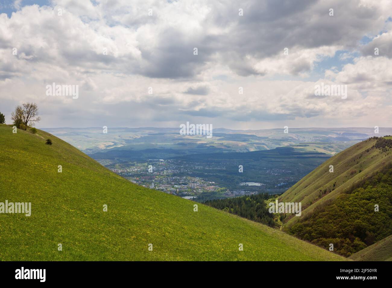 Slopes of the Borgustan Range and the city of Kislovodsk in the valley ...