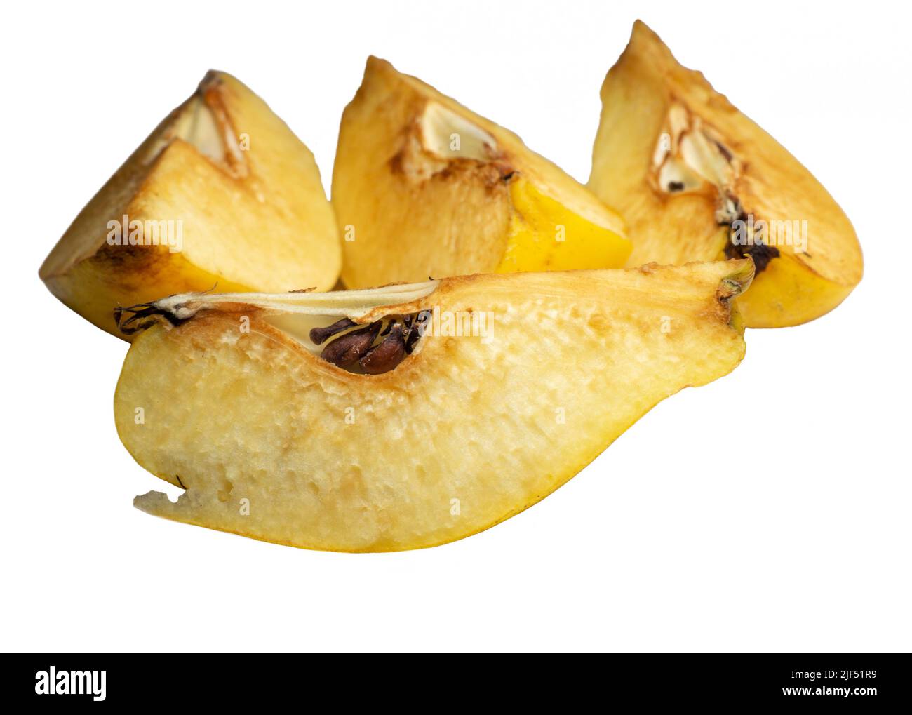 chopped quince. Juicy fruits on a white background. Ripe useful product ...
