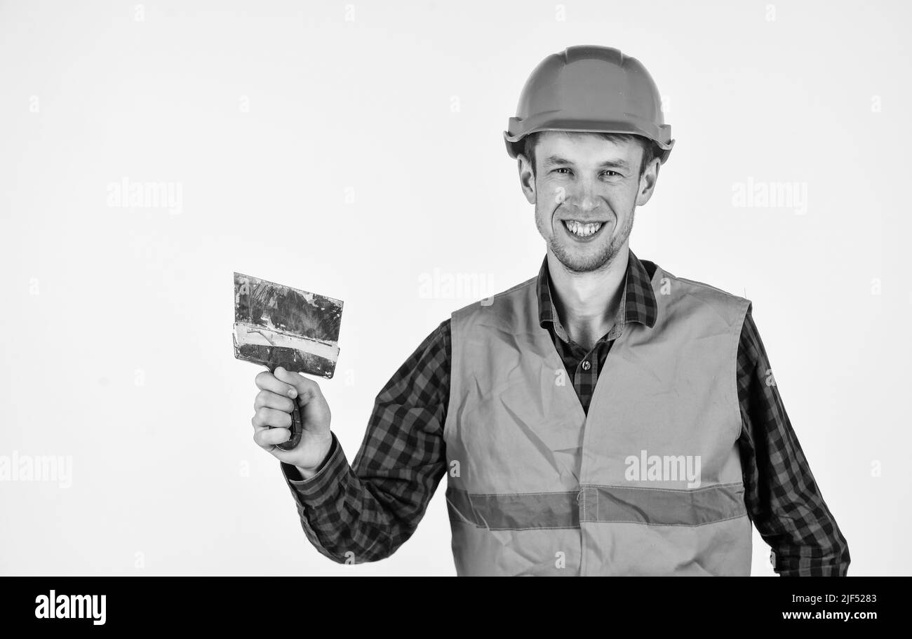 professional repairman in helmet. build and construction. skilled ...