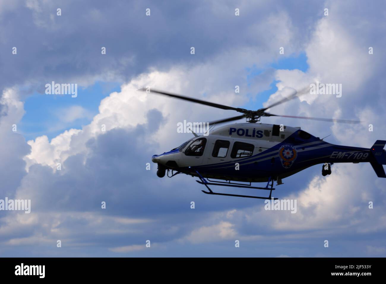 Turkish police helicopter flying in a cloudy day Stock Photo - Alamy