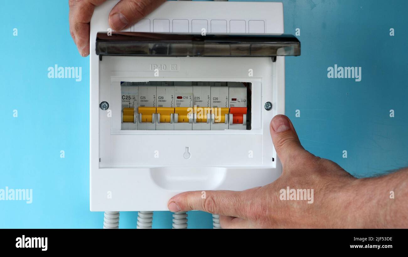 Electrical Installation work of installing consumer unit Stock Photo ...