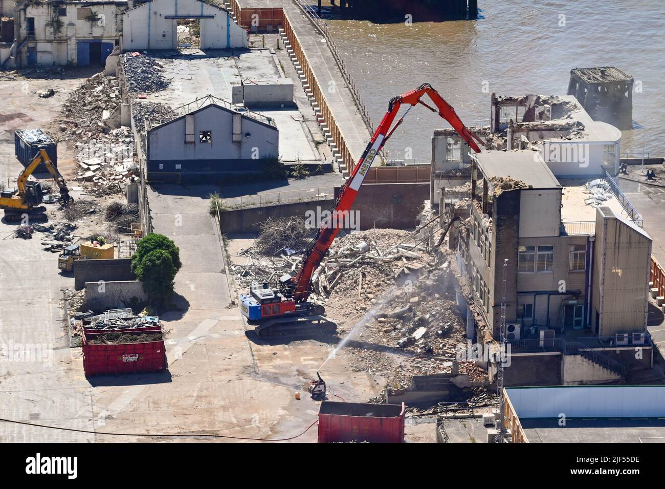 London, England - June 2022: Aerial view of a mechanical digger with ...