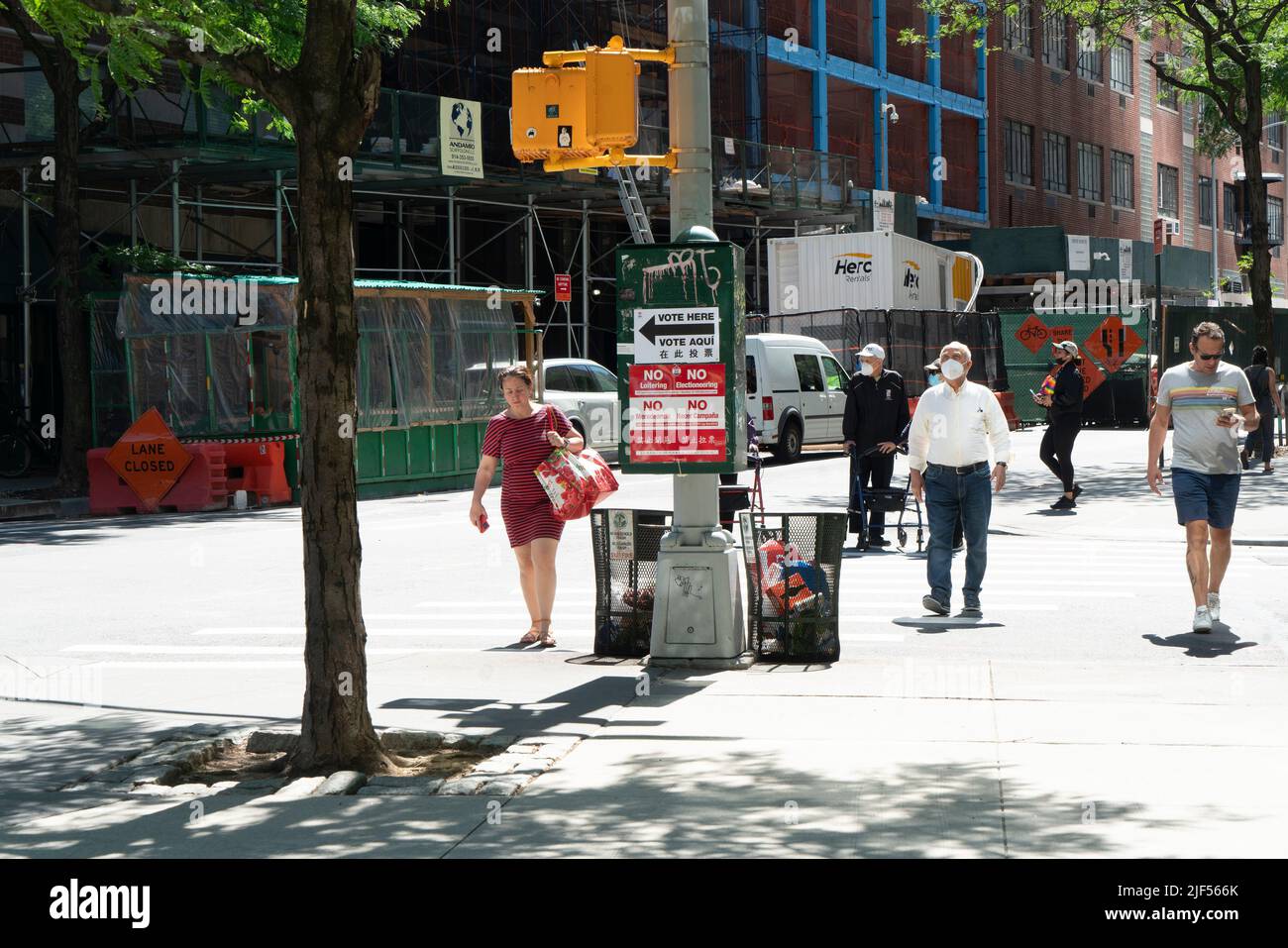 On primary election day in New York City, people crossed a Manhattan ...