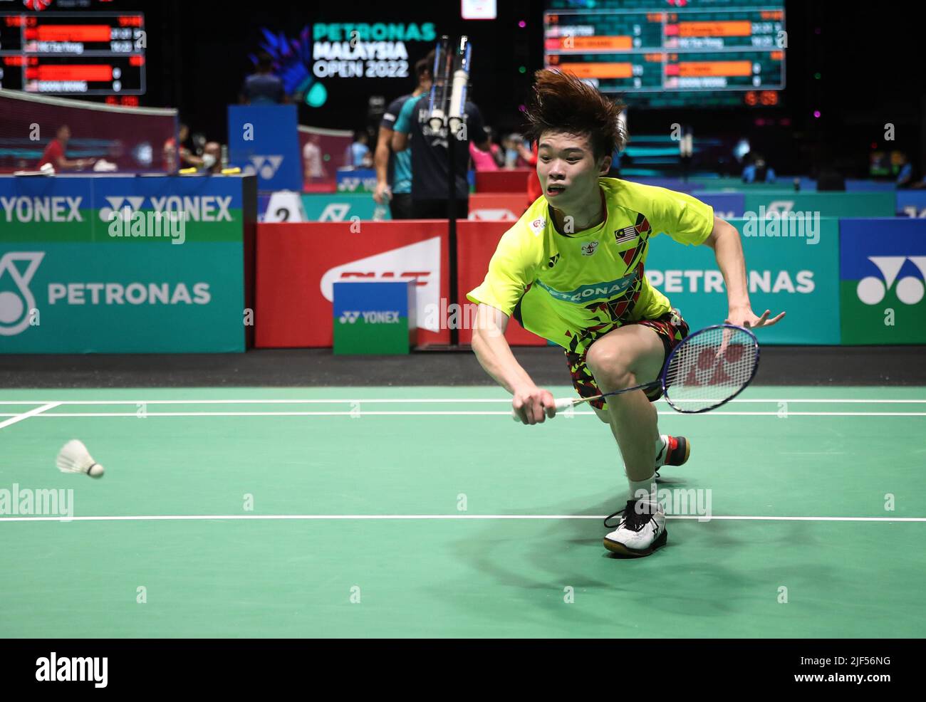 Ng Tze Yong of Malaysia competes against Lu Guang Zu of China during ...