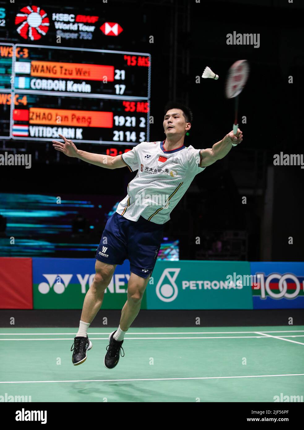 Zhao Jun Peng of China competes against Kunlavut Vitidsarn of Thailand ...