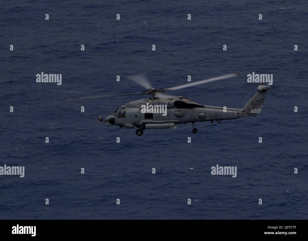 PACIFIC OCEAN (June 24, 2022) An MH-60R Sea Hawk helicopter, assigned ...