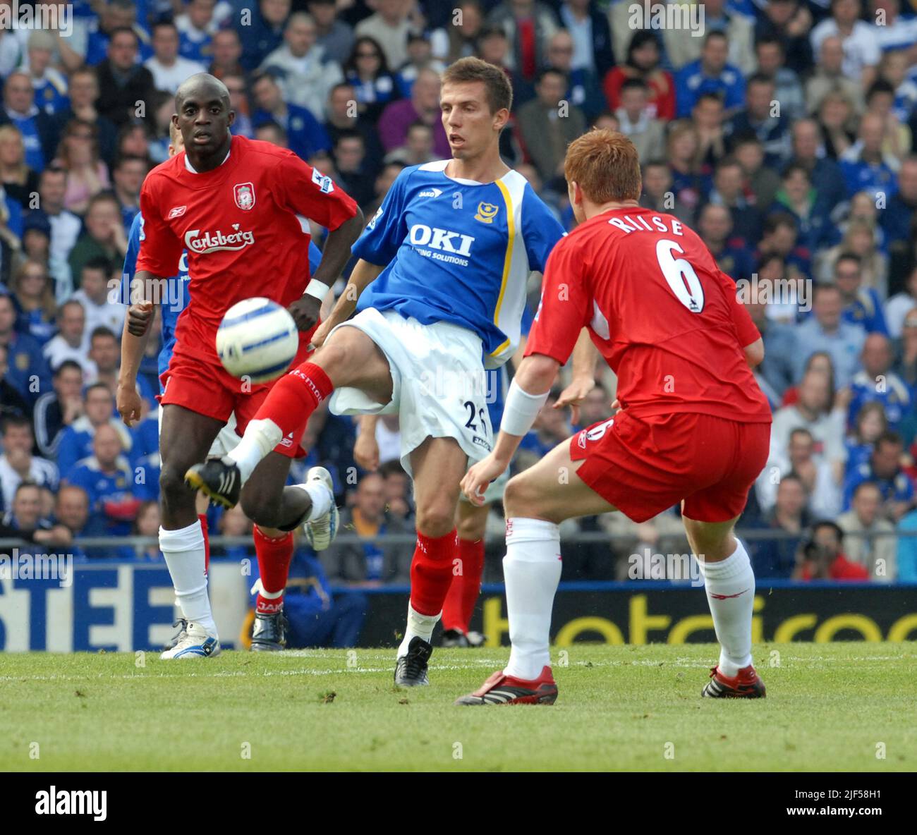 PORTSMOUTH V LIVERPOOL GARY O'NEIL CLEARS FROM JOHN ARNE RIISE AND ...