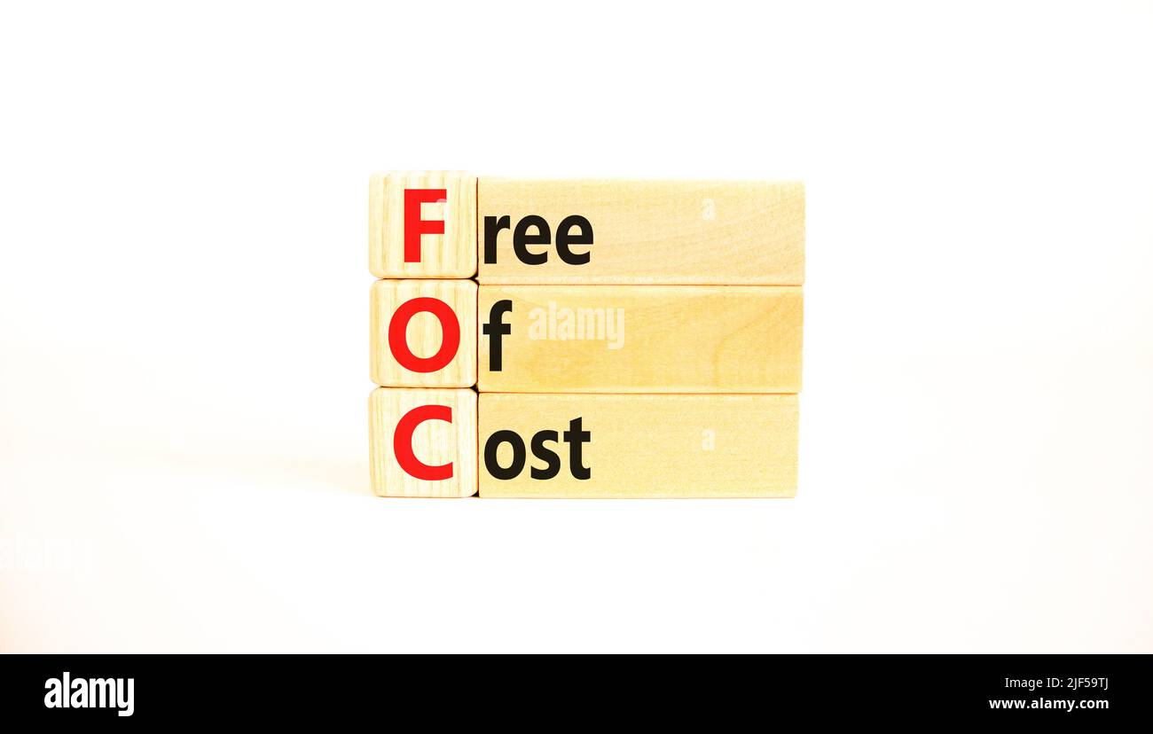 FOC free of cost symbol. Concept words FOC free of cost on wooden ...