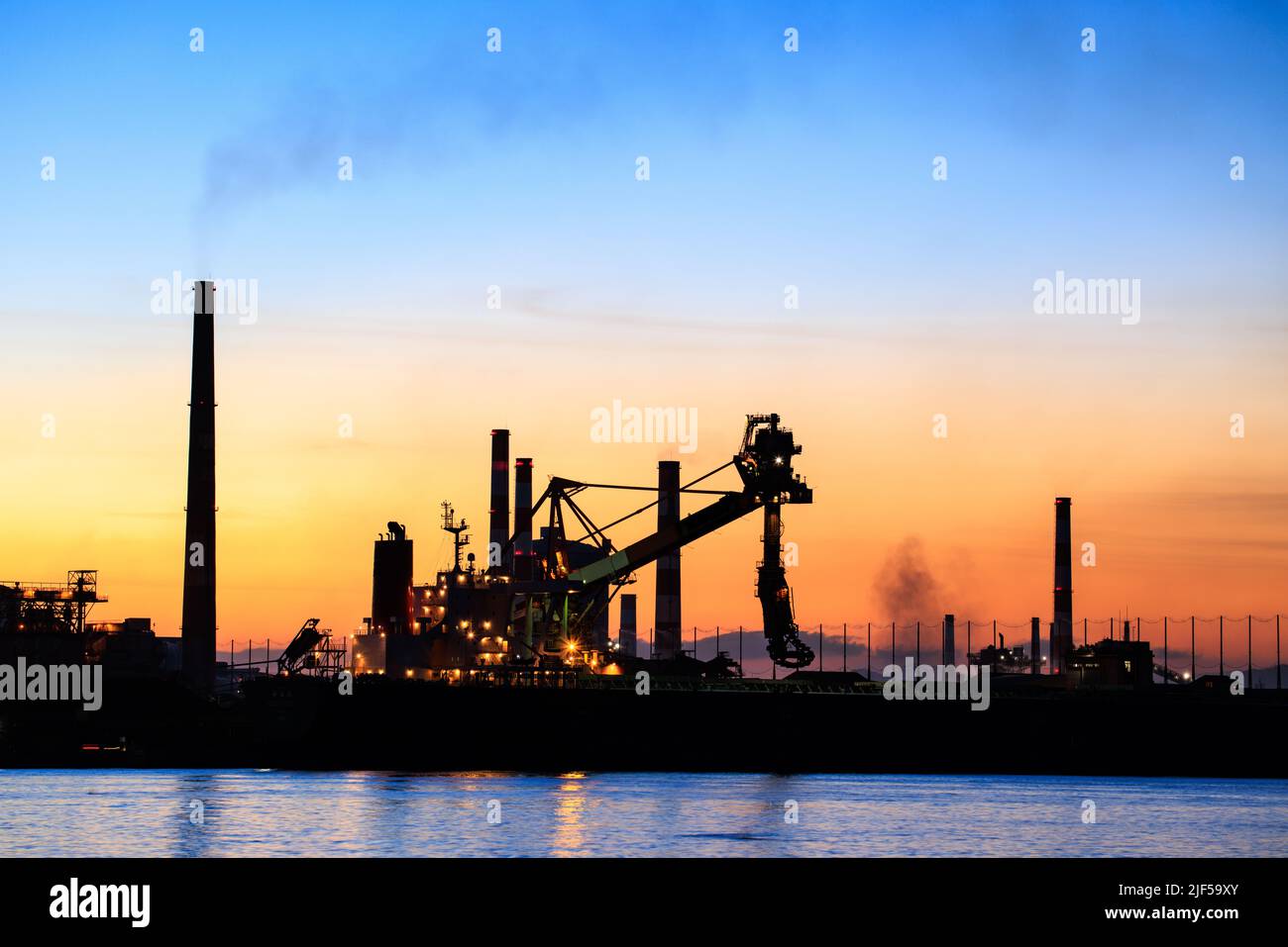 Factory silhouette pollution smokestacks hi-res stock photography and ...